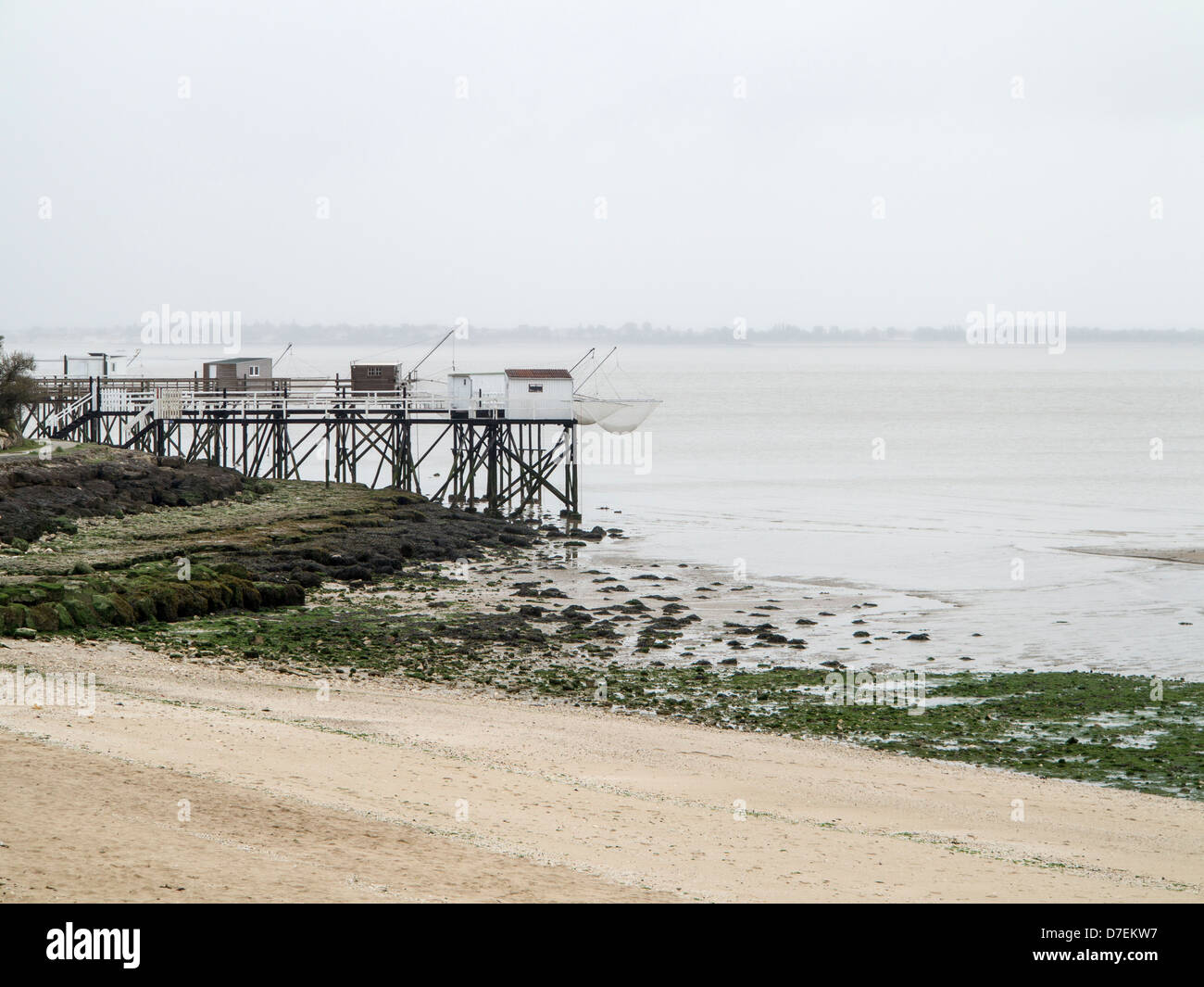 Carrelets fishing huts on stilts on the beach at Fouras, Charente ...