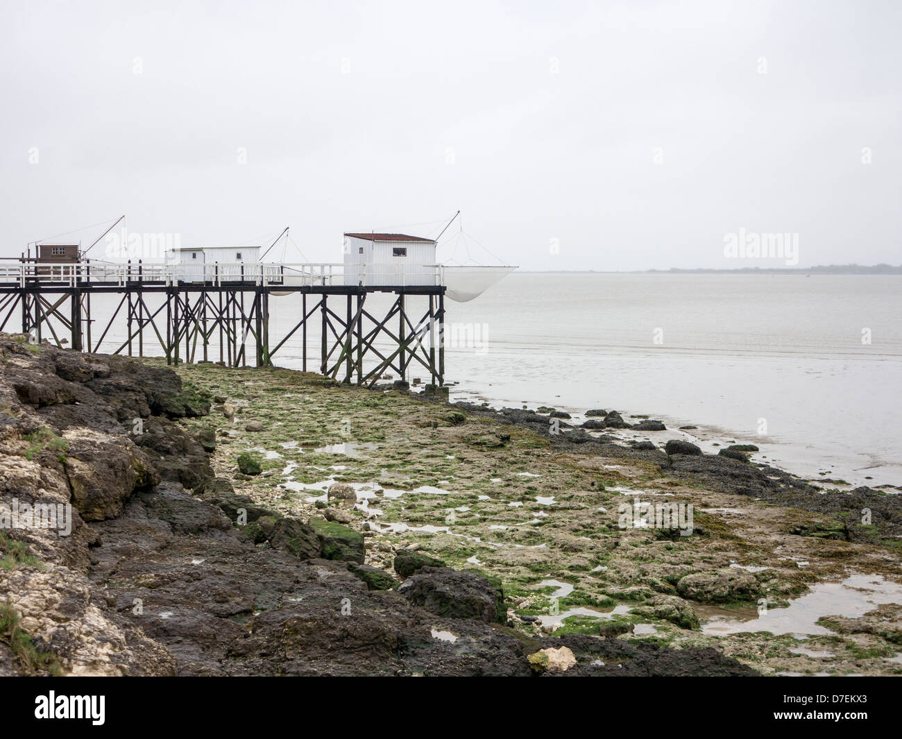 Carrelets fishing huts on stilts on the beach at Fouras, Charente ...