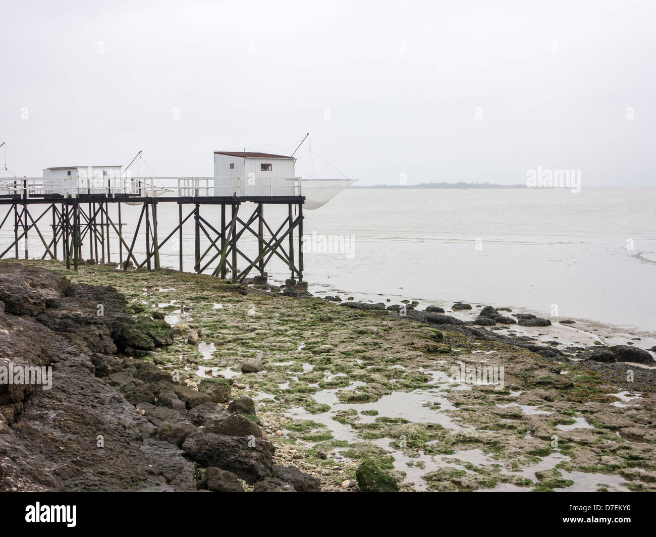Carrelets fishing huts on stilts on the beach at Fouras, Charente ...