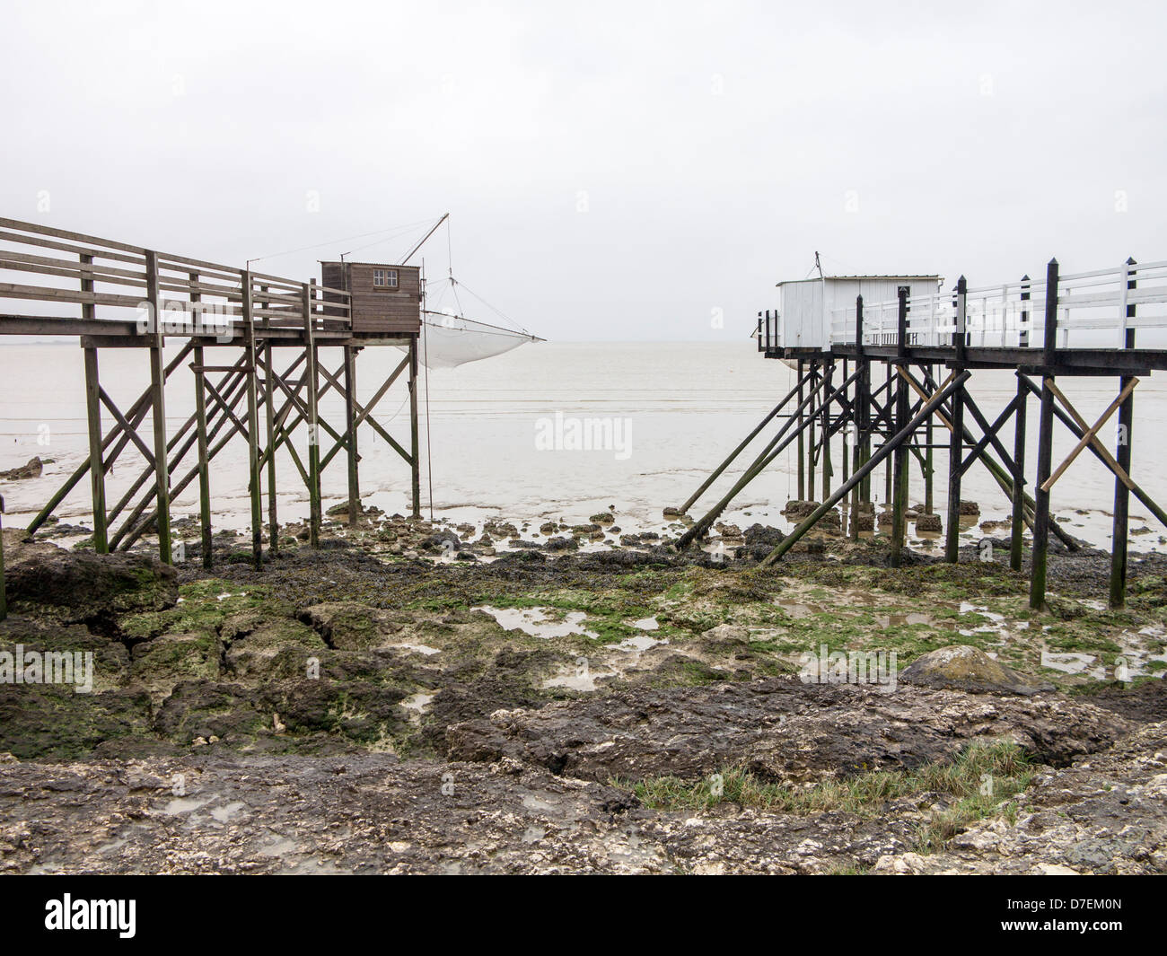 Carrelets fishing huts on stilts on the beach at Fouras, Charente ...