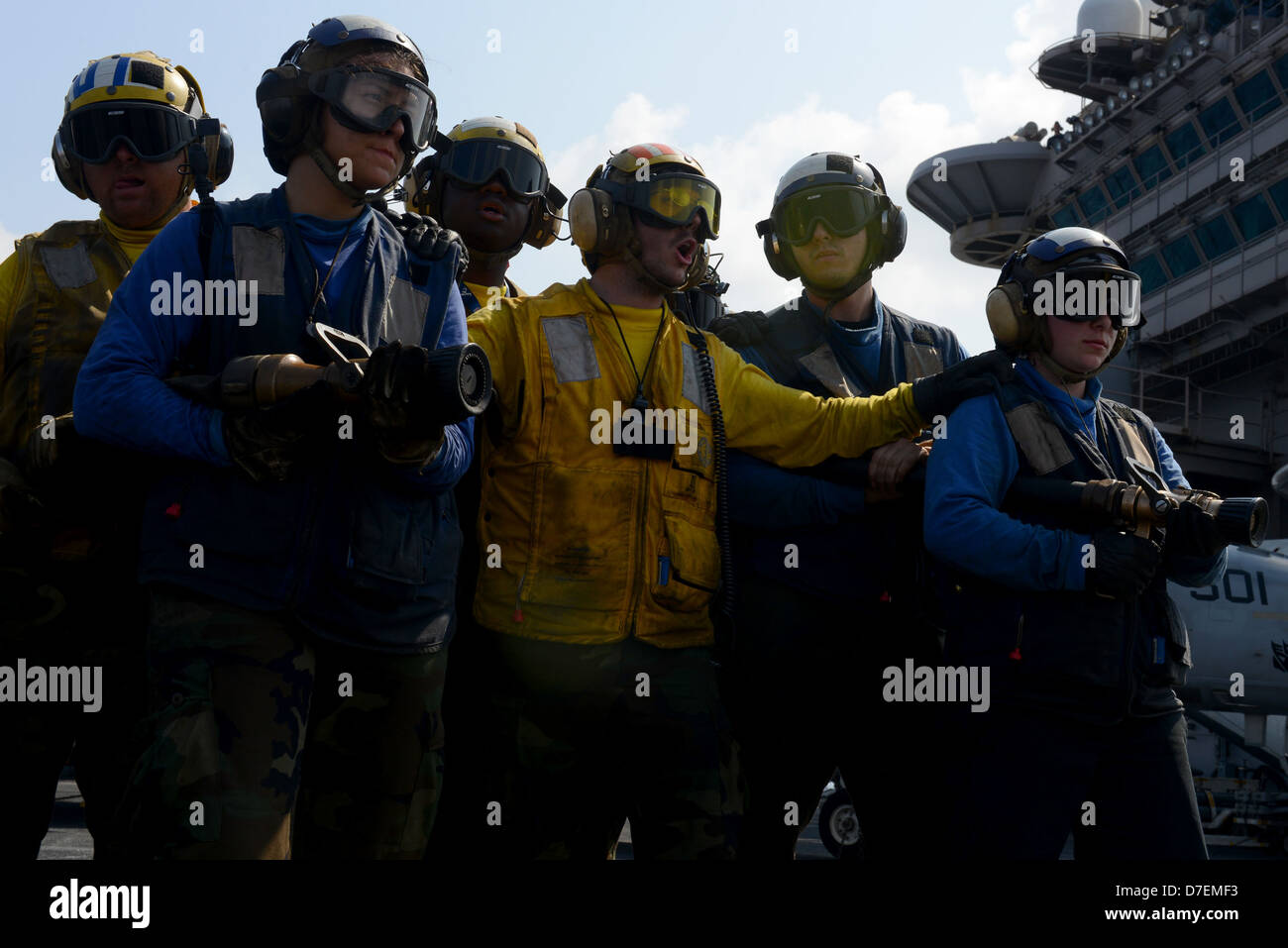 Sailors practice firefighting at sea Stock Photo - Alamy