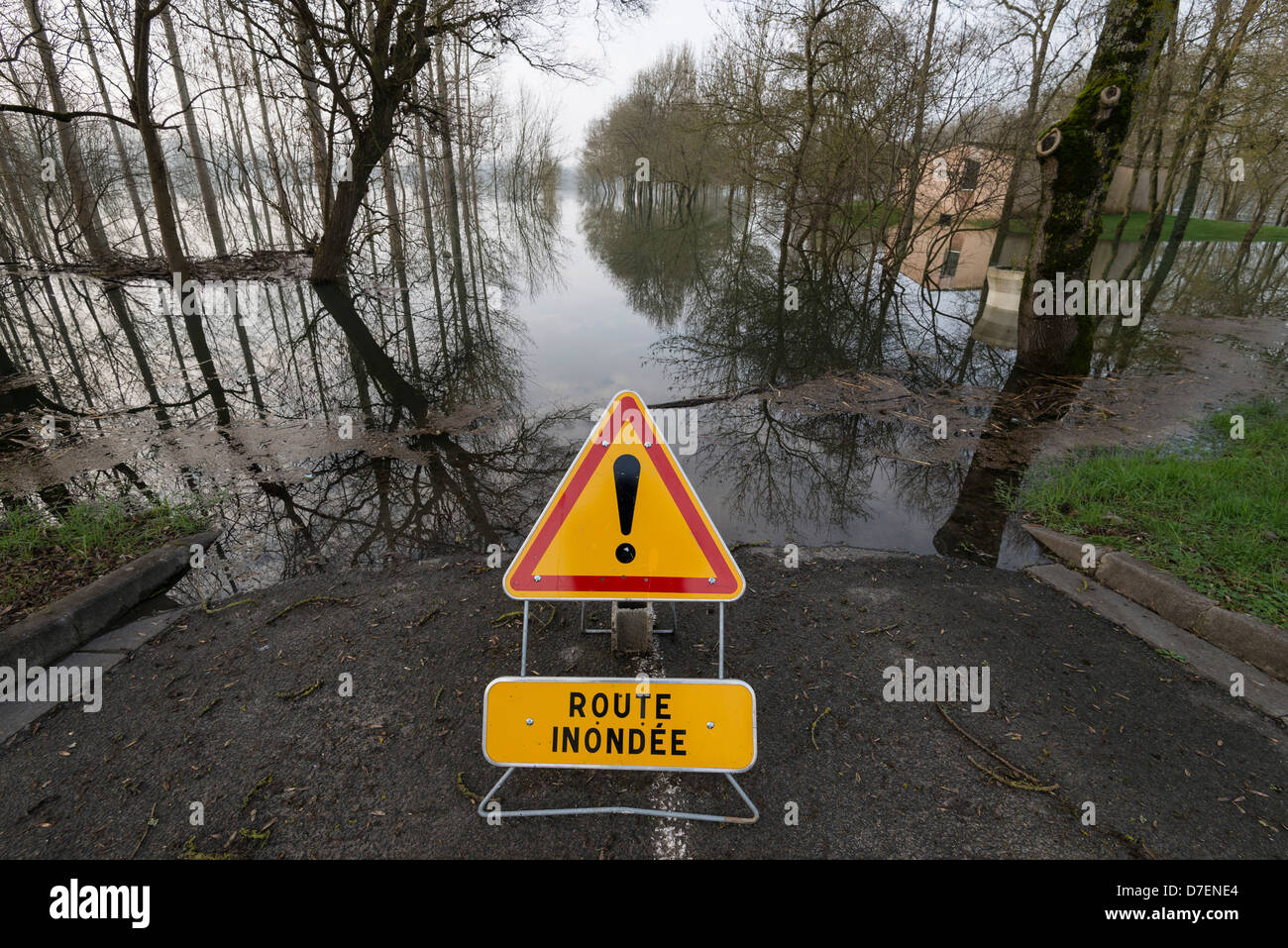 The Charente river in flood and road submerged Stock Photo - Alamy