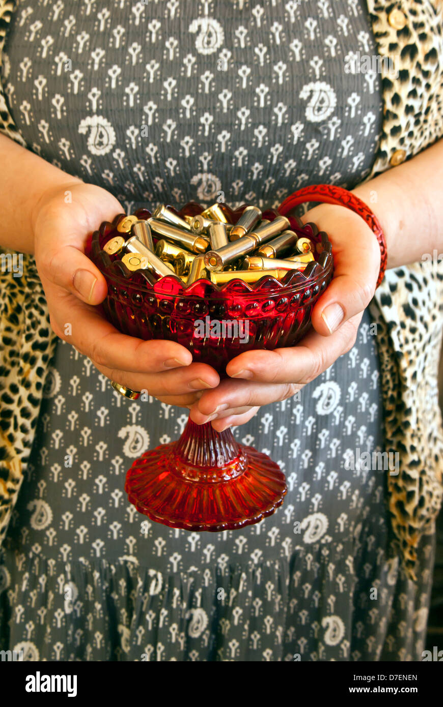 red bowl of bullets Stock Photo - Alamy