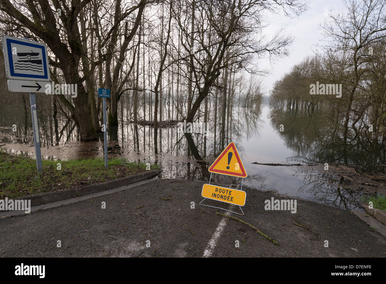 The Charente river in flood and road submerged Stock Photo - Alamy