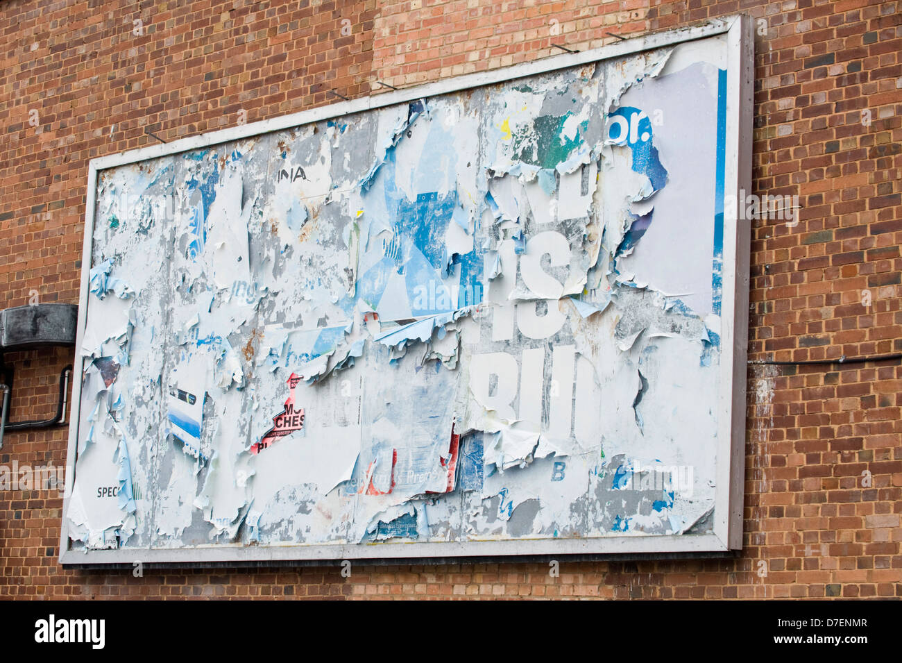 Derelict billboard on brick wall of building in Exeter Devon England UK ...