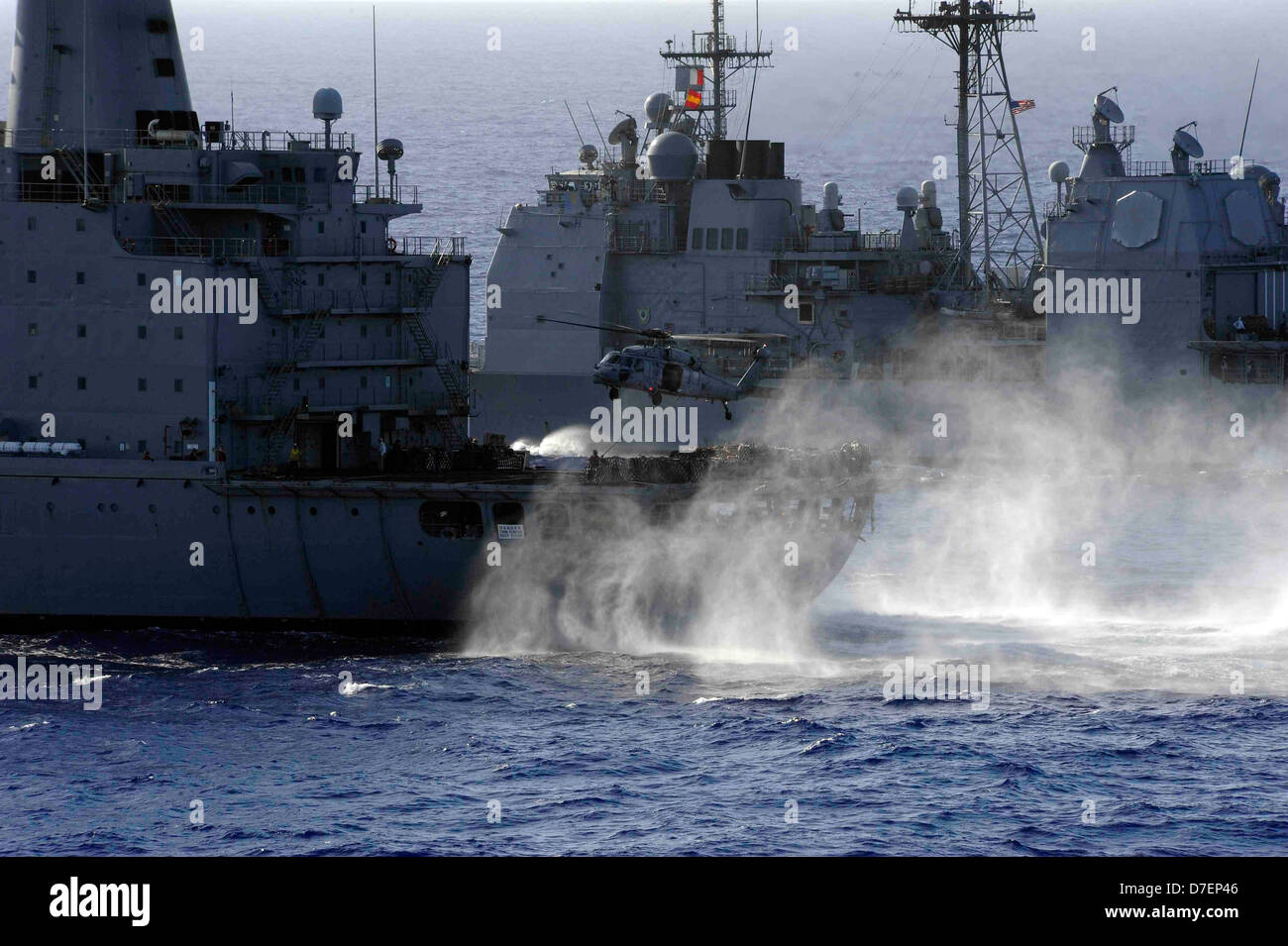 A helicopter drops off cargo Stock Photo - Alamy