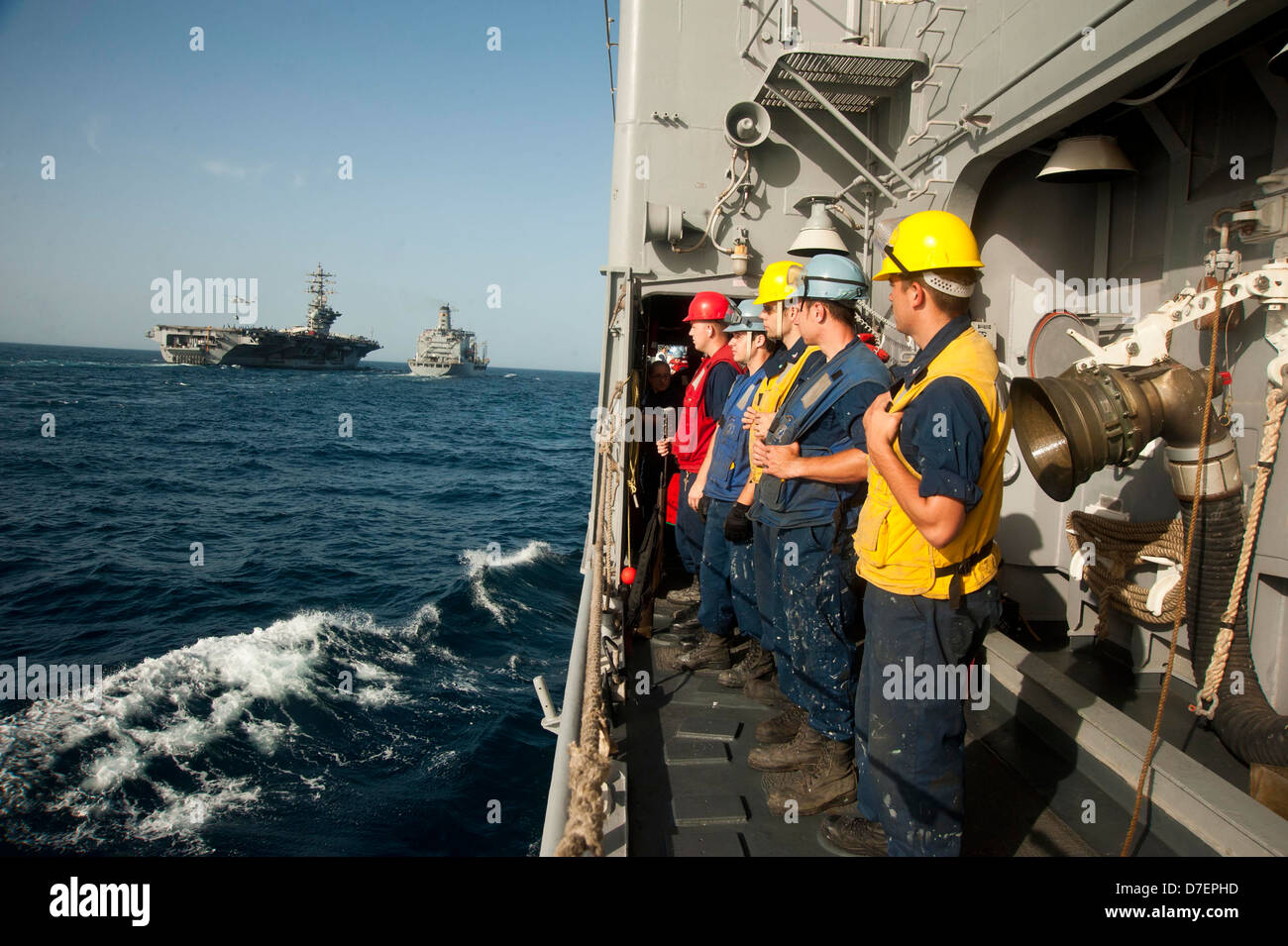 Sailors stand by for a refueling at sea Stock Photo - Alamy