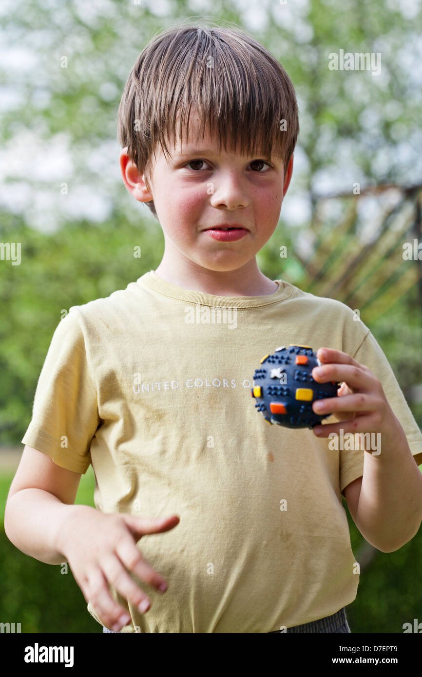 Portrait of a boy playing outdoor Stock Photo - Alamy
