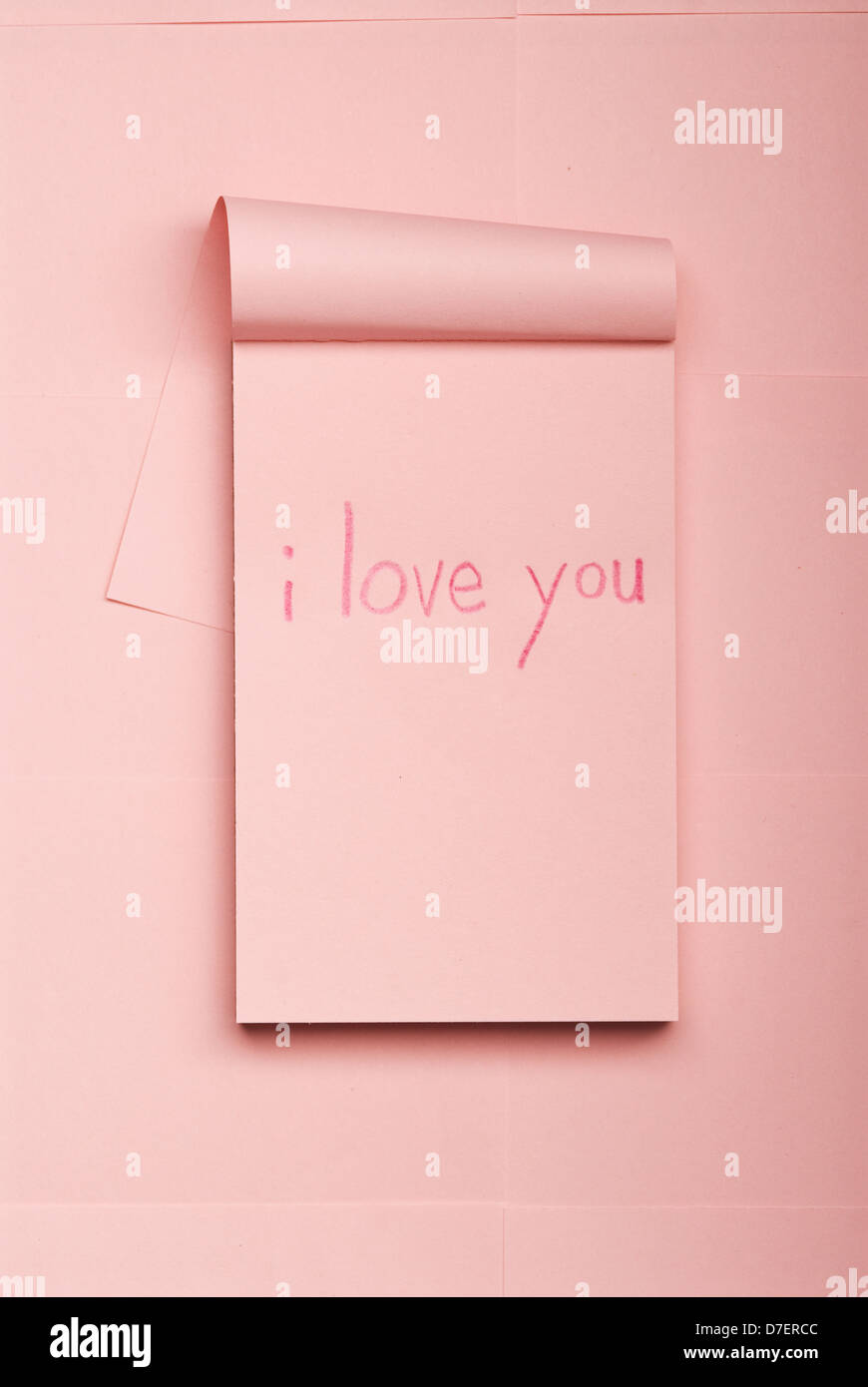 Notepad with i love you written in pencil crayon Stock Photo - Alamy