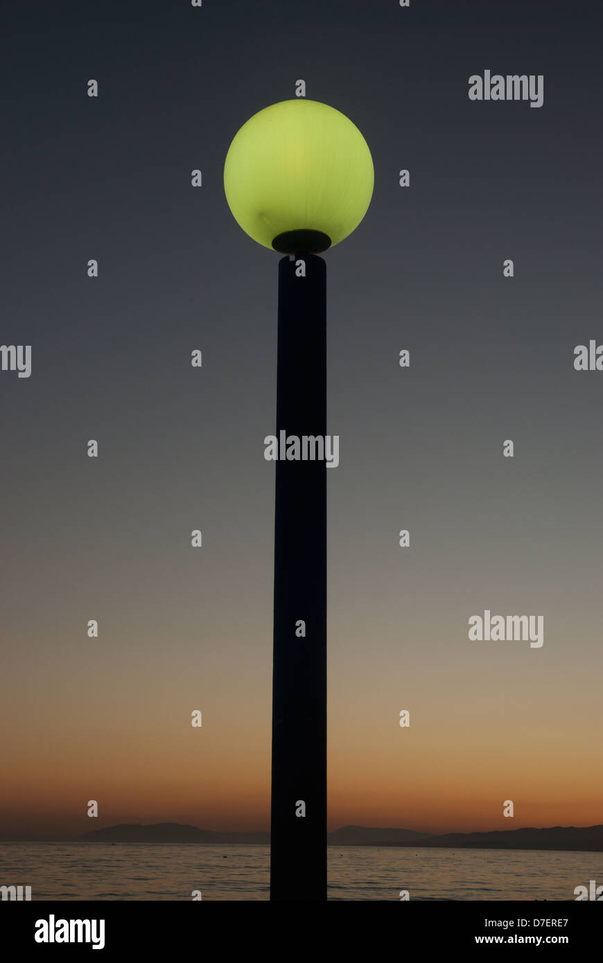 Lamp post lighting up at late evening;Malaga andalusia spain Stock ...