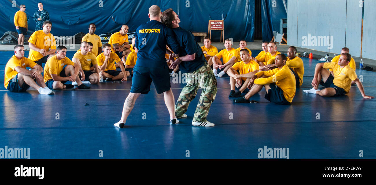 Instructors conduct security group training Stock Photo - Alamy