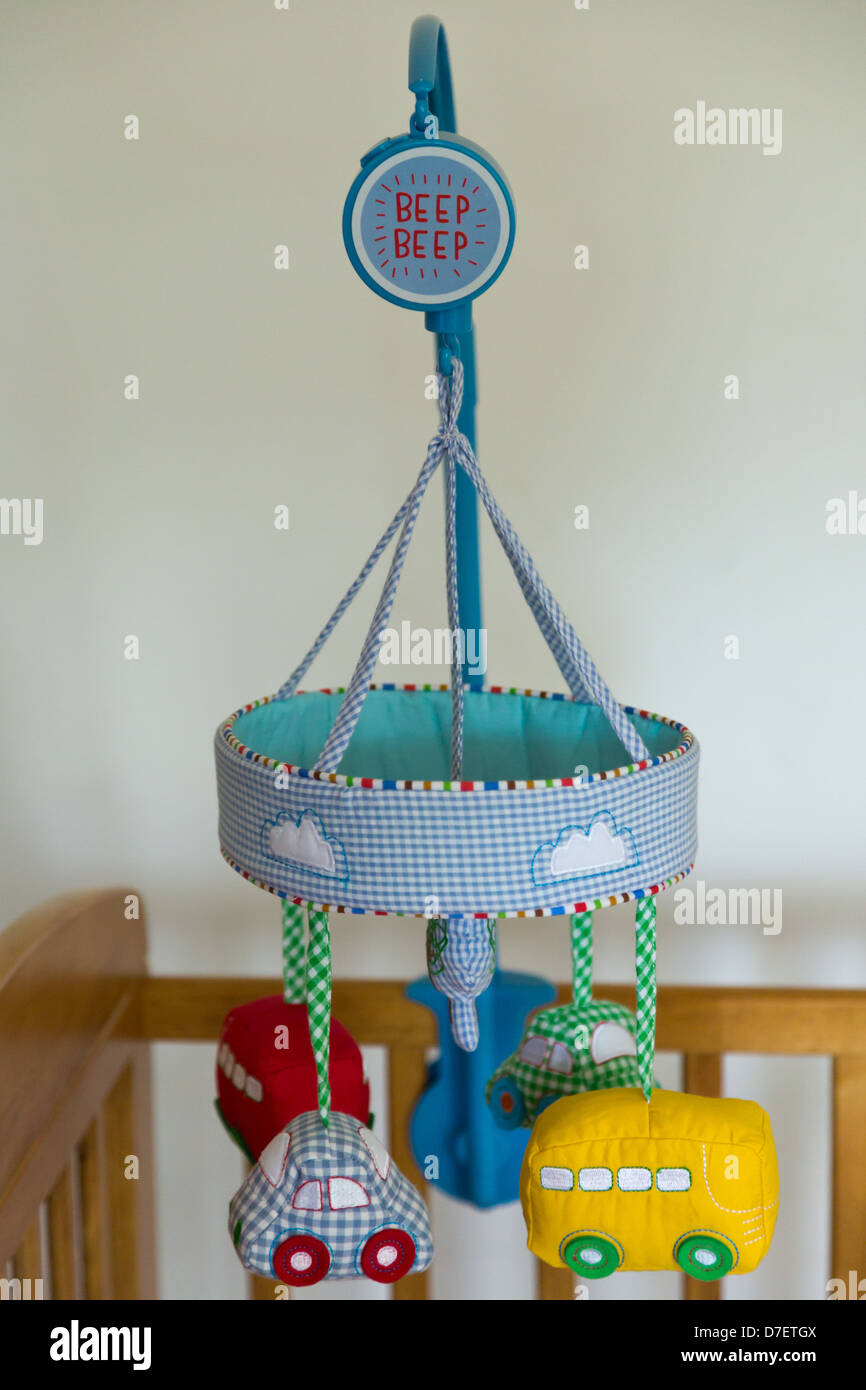 Cot Mobile attached to the side of a cot Stock Photo - Alamy