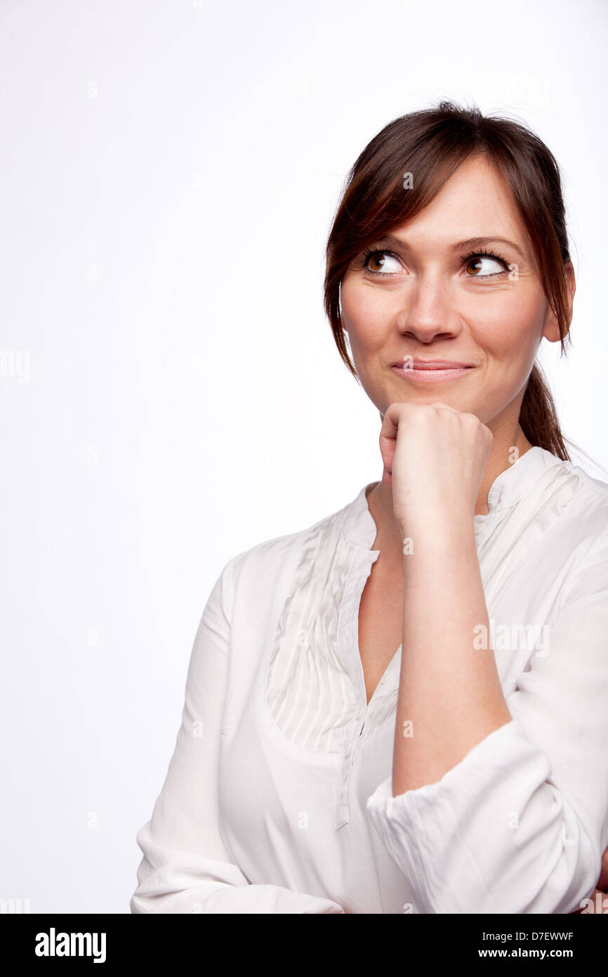 Thinking business woman smiling looking up at copy space isolated on ... Thinking business woman smiling looking up at copy space isolated on ...