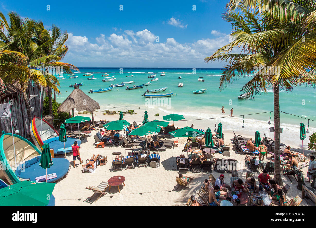beach front club facing the Caribbean and fishing boats Stock Photo - Alamy