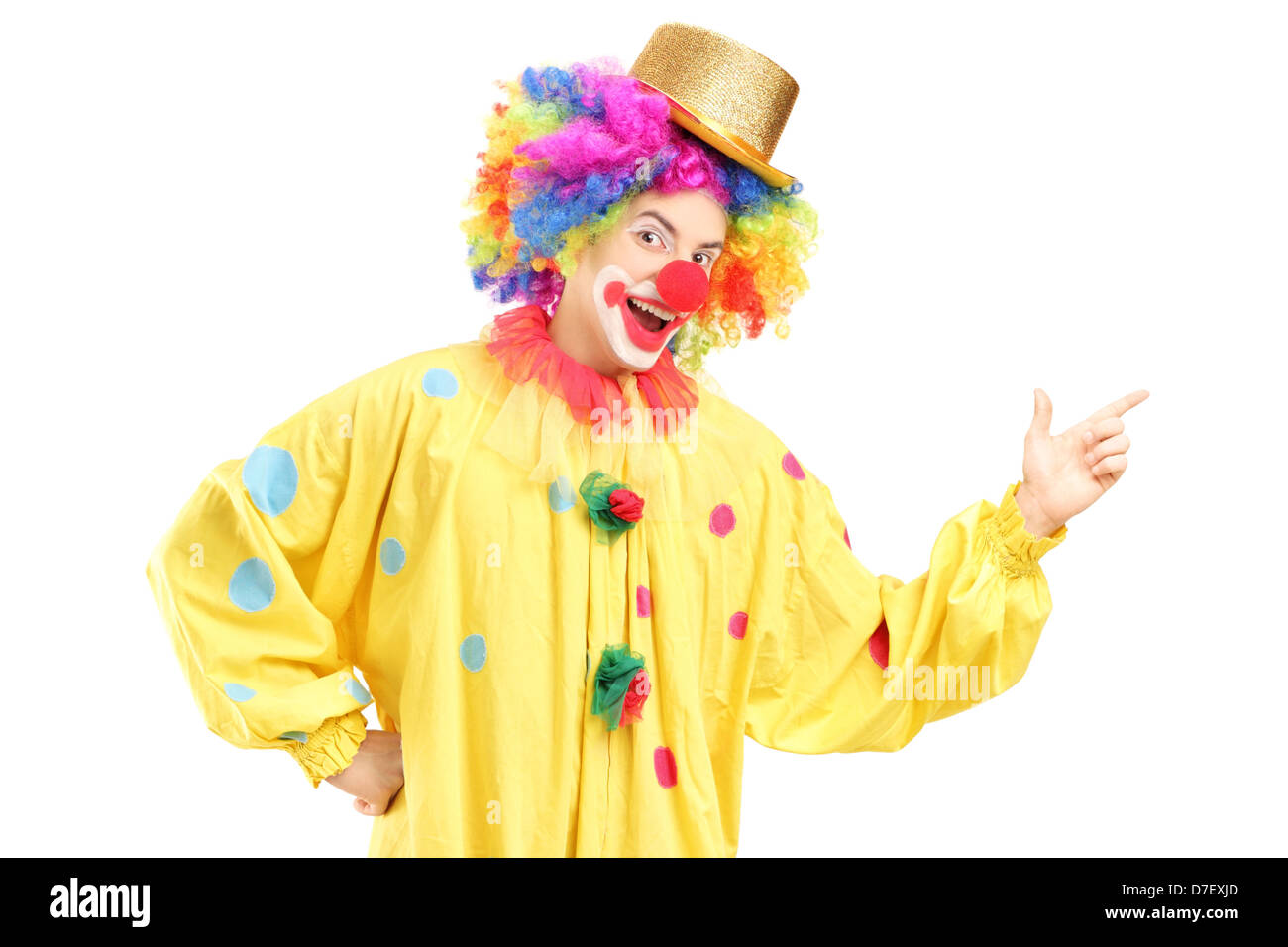 A cheerful clown in a yellow costume isolated on white background Stock ...