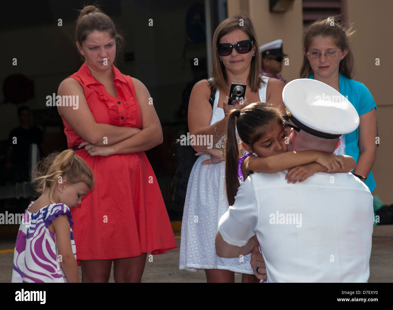 Sailor says good-bye to his family Stock Photo - Alamy