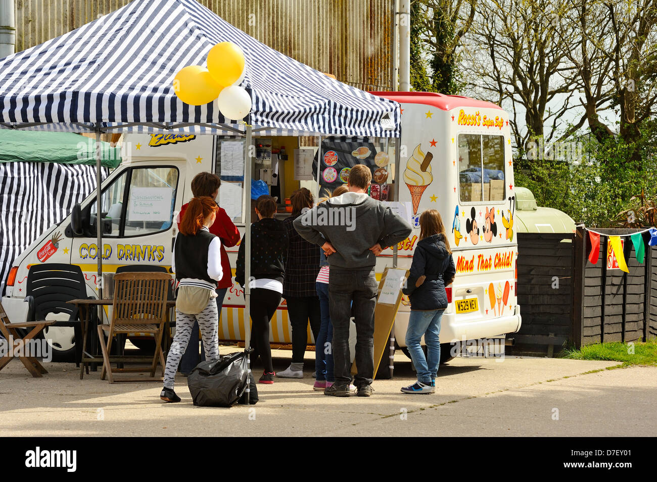 People queuing for a ice cream from the ice cream van Stock Photo - Alamy