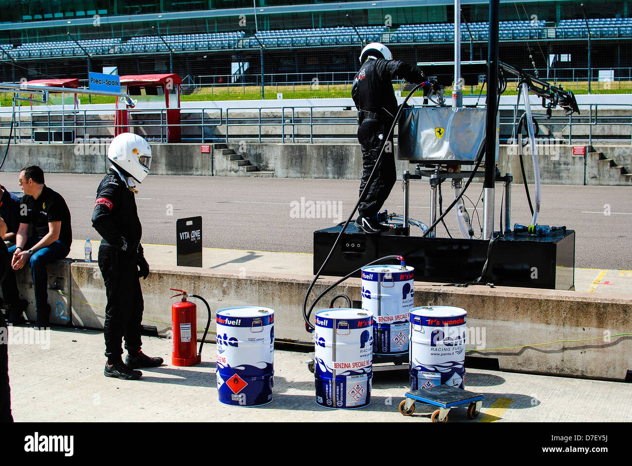 Pit crew refueling Stock Photo - Alamy
