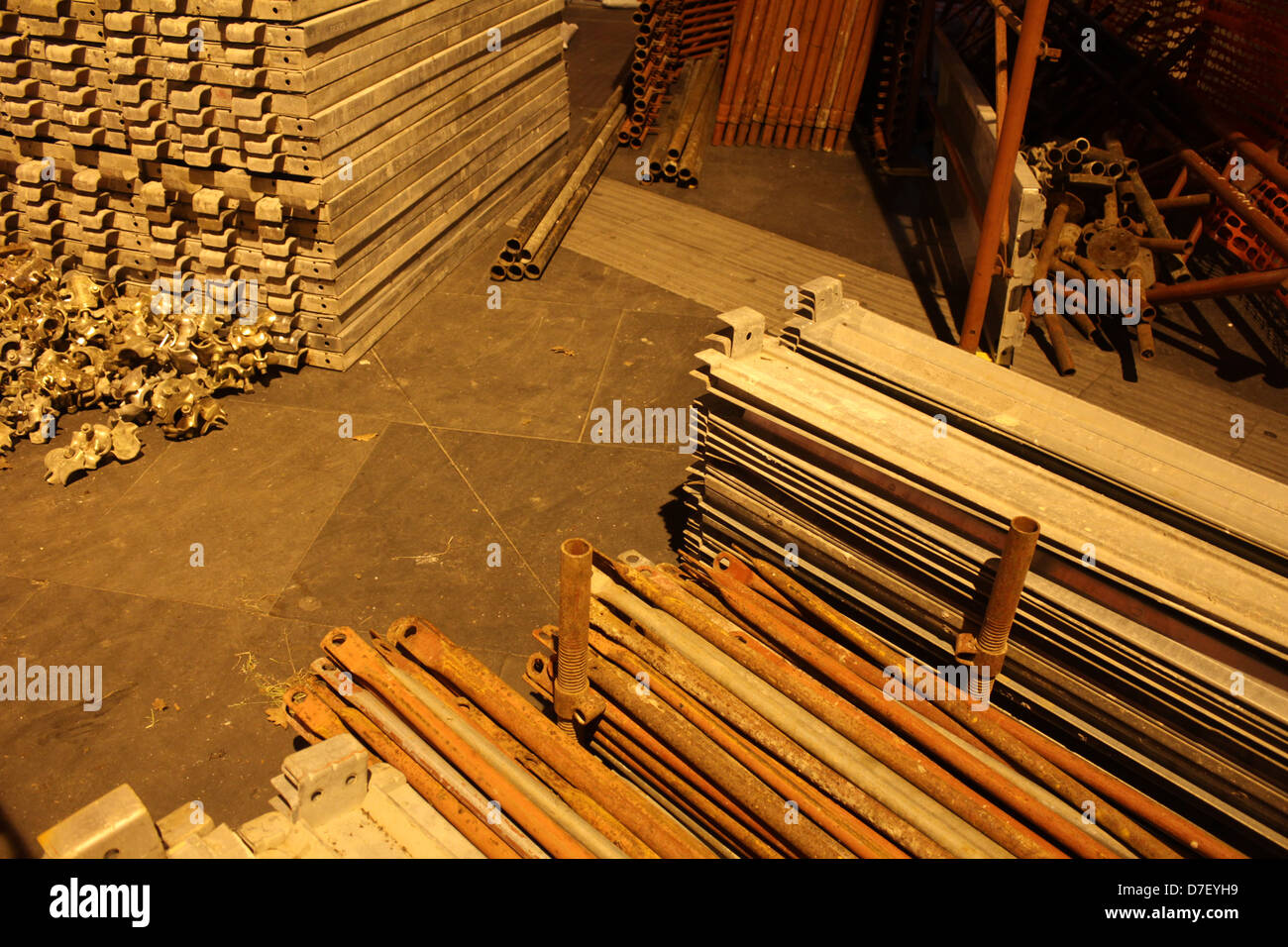 many construction scaffolding fittings in a pile at night Stock Photo ...