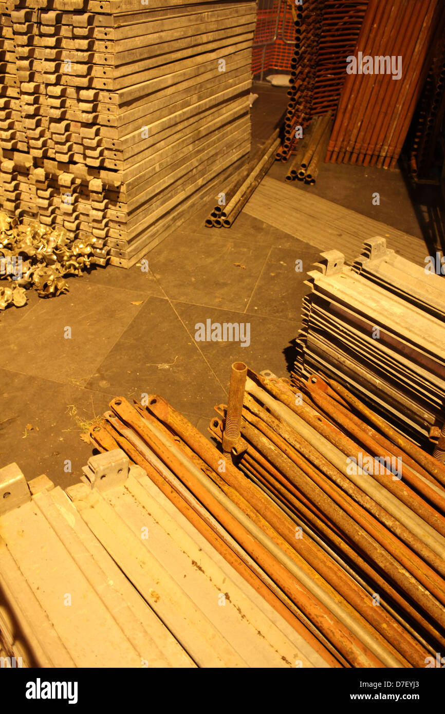 many construction scaffolding fittings in a pile at night Stock Photo ...