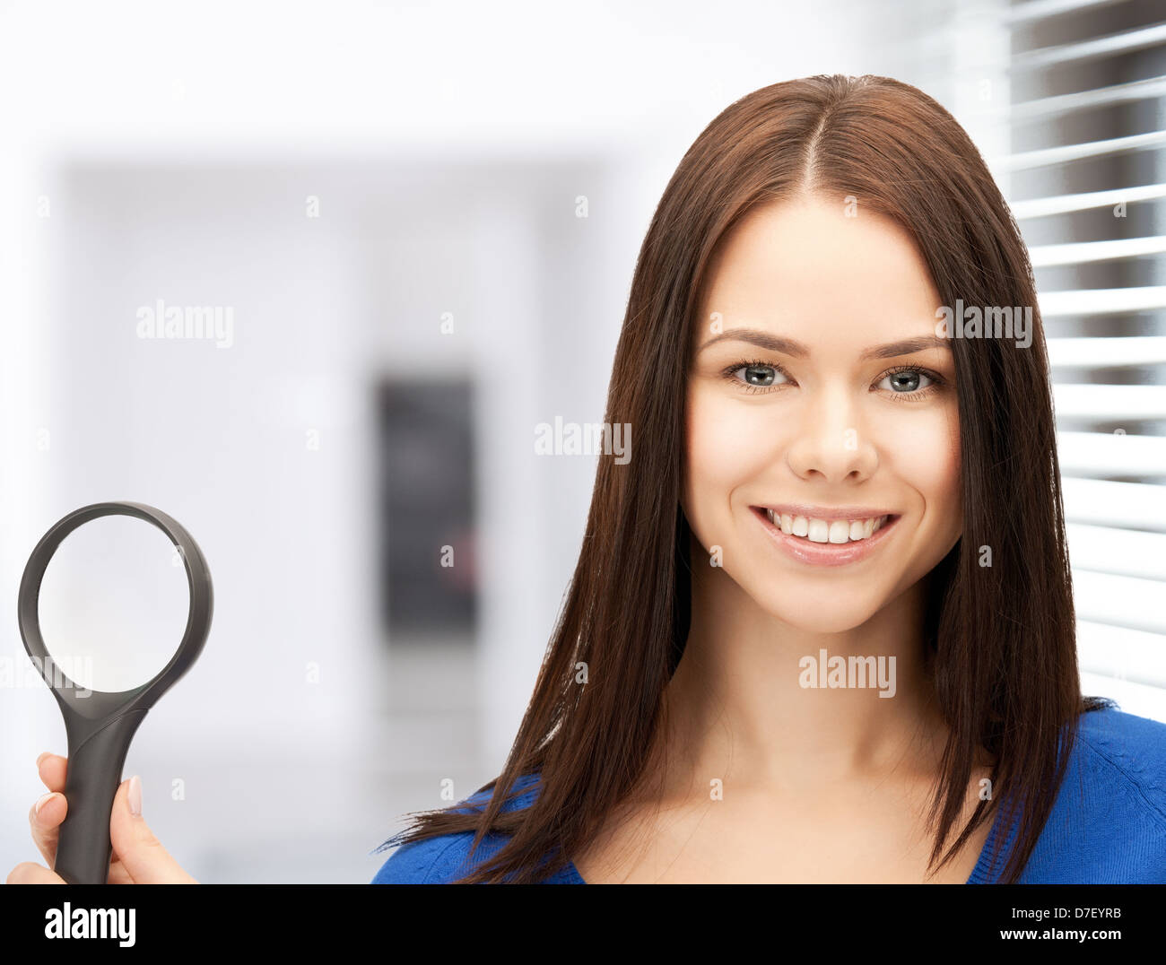 woman with magnifying glass Stock Photo - Alamy