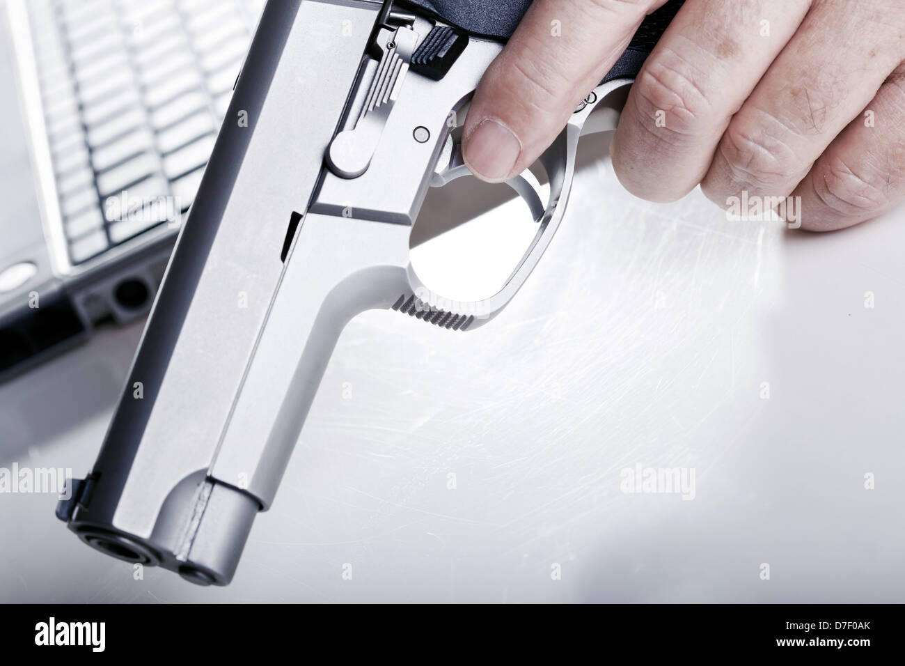 VExtreme close up left hand mature adult man holding 9mm handgun his ...