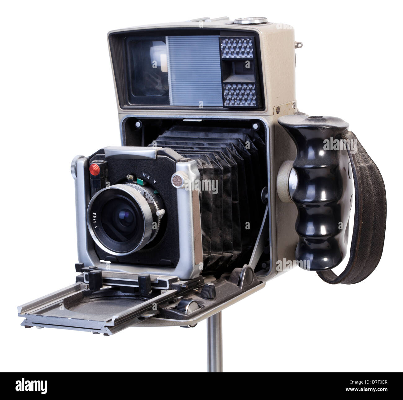 Diagonal view of an old fashioned dusty vintage camera isolated on ...