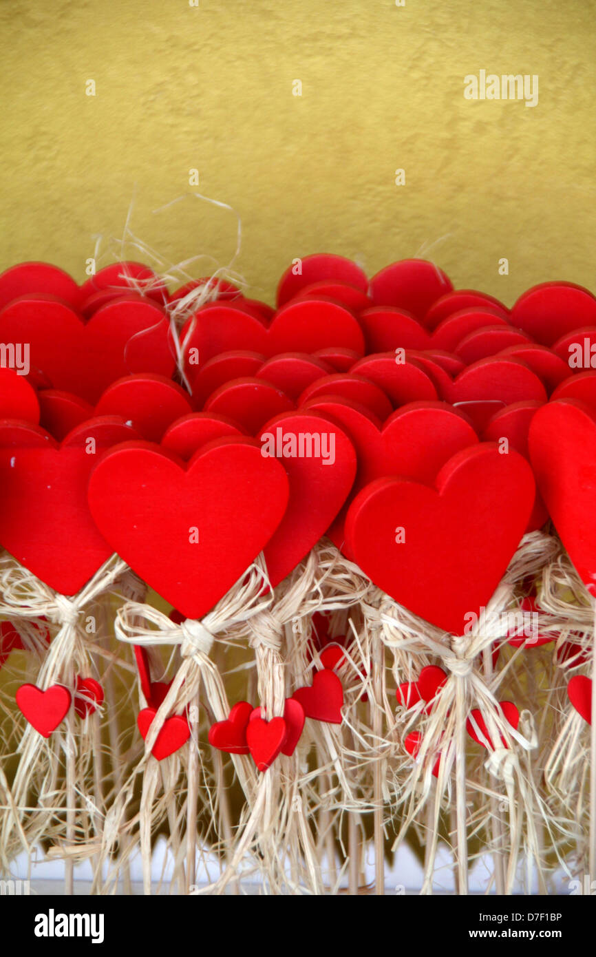 love hearts on a stick in shop window Stock Photo - Alamy