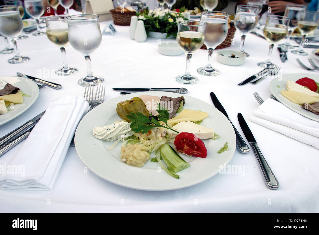 Served starters plates on table Stock Photo - Alamy