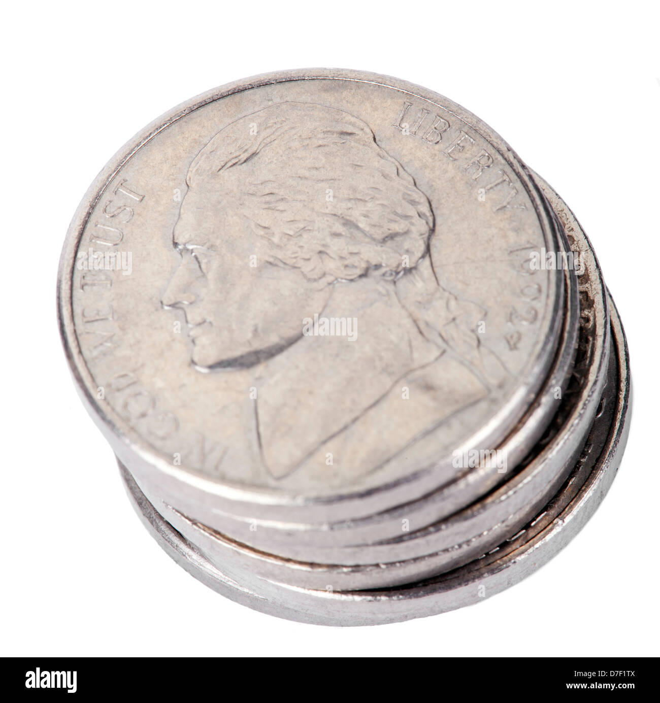 A high angle shot stack 5 US cents (Nickel) coins isolated on white ...