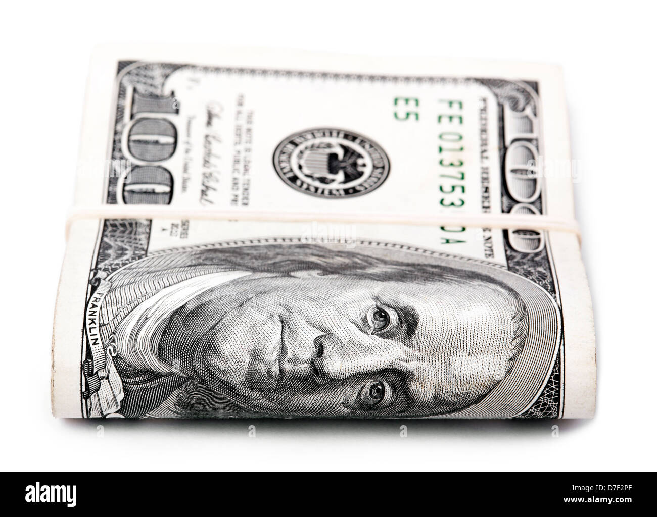 A bunch of 100 American Dollars money notes folded and held together ...