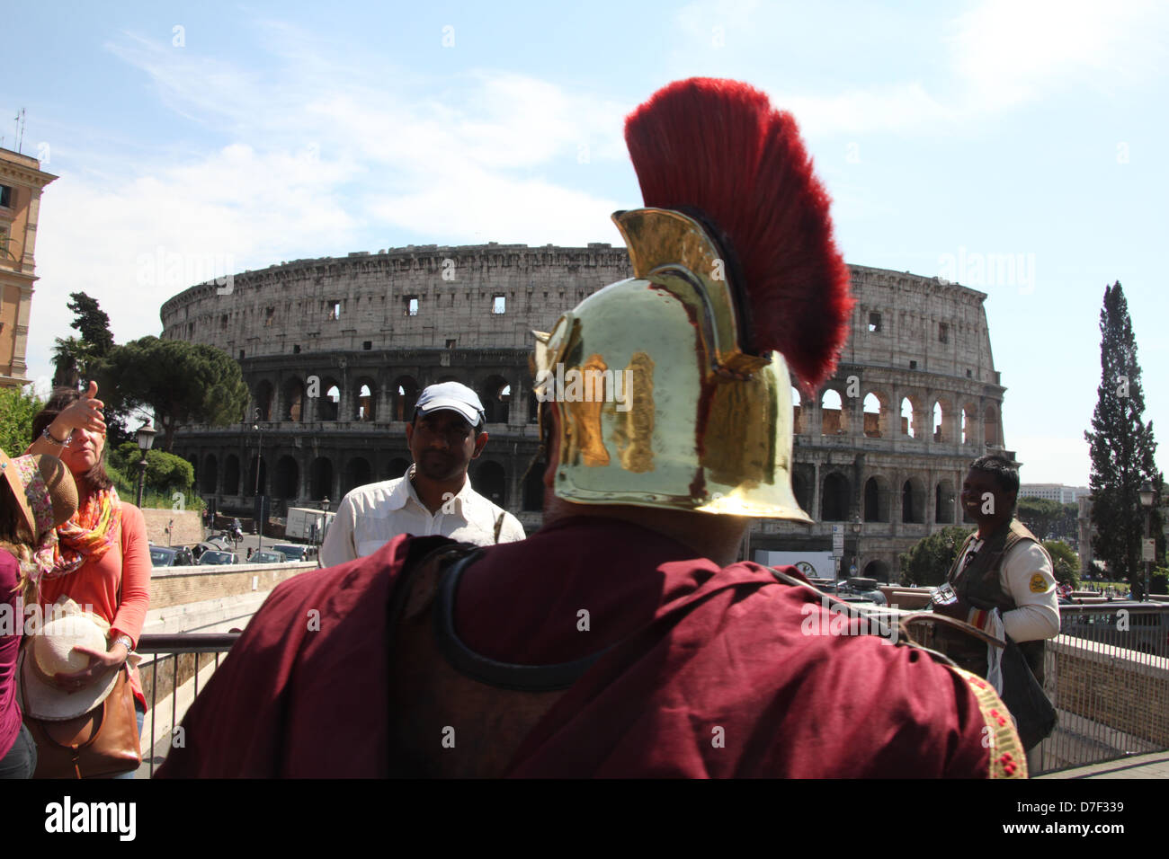 scene by the colosseum in rome italy Stock Photo - Alamy