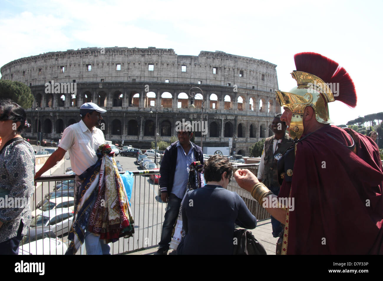 scene by the colosseum in rome italy Stock Photo - Alamy