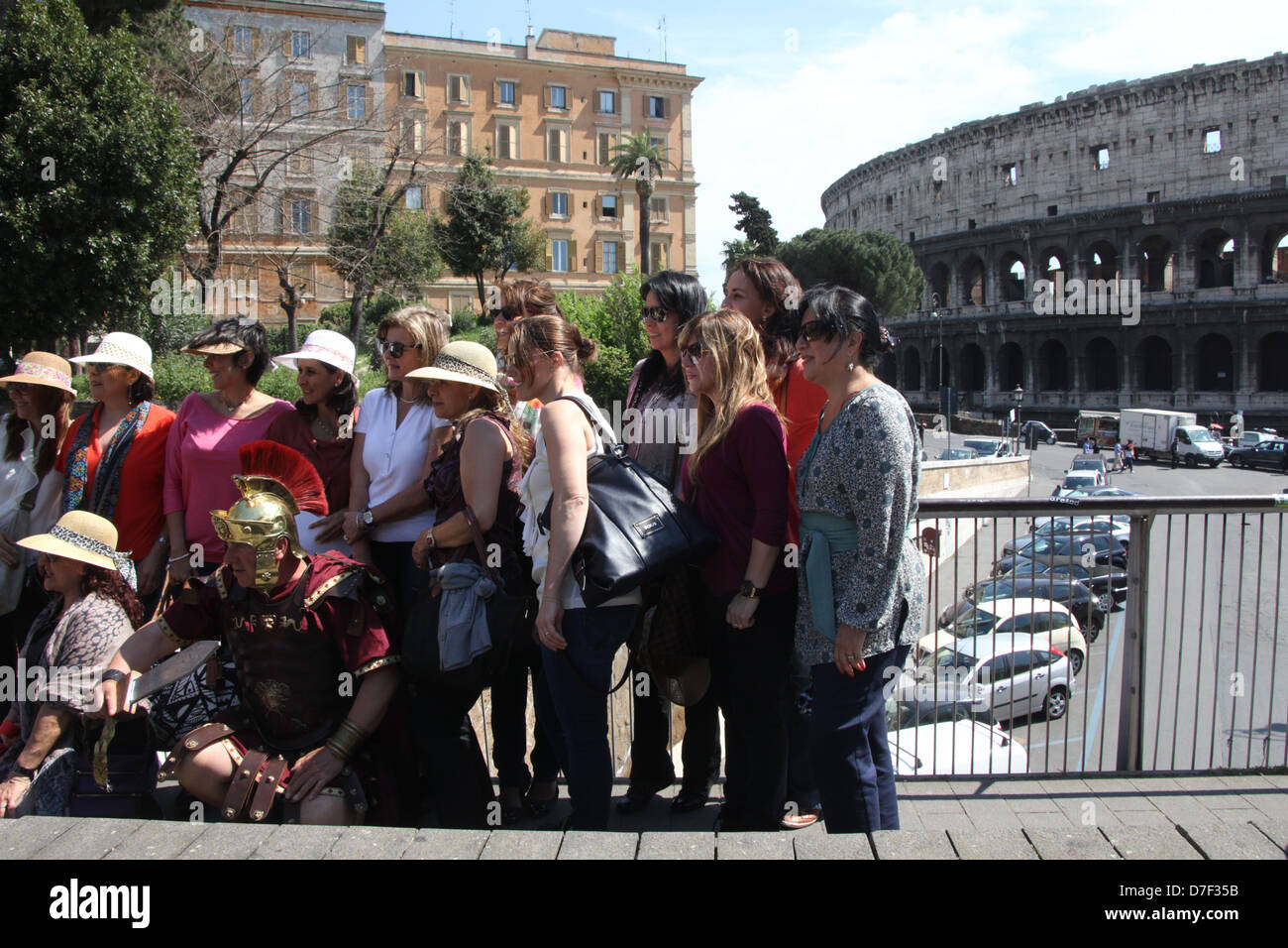scene by the colosseum in rome italy Stock Photo - Alamy