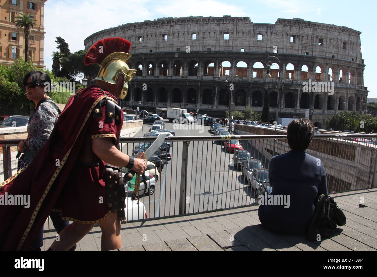 scene by the colosseum in rome italy Stock Photo - Alamy