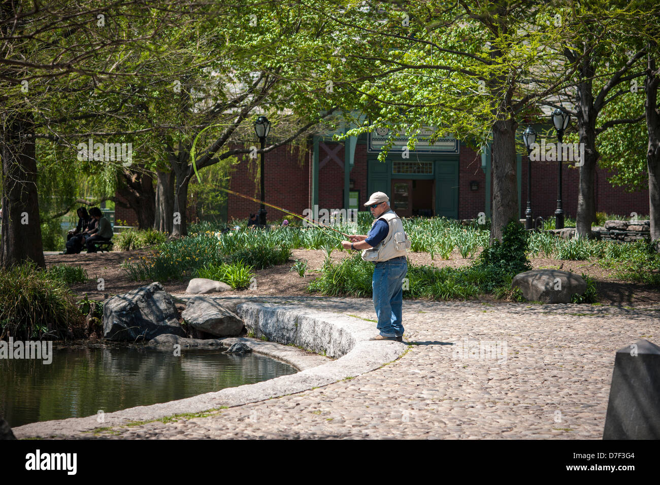 Fishermen in the Harlem Meer in Central Park are advised to retain any ...