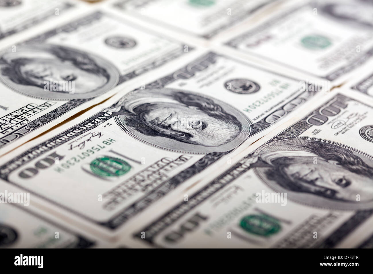 Macro shot Benjamin Franklin's portrait on 100 US$ money note two more ...