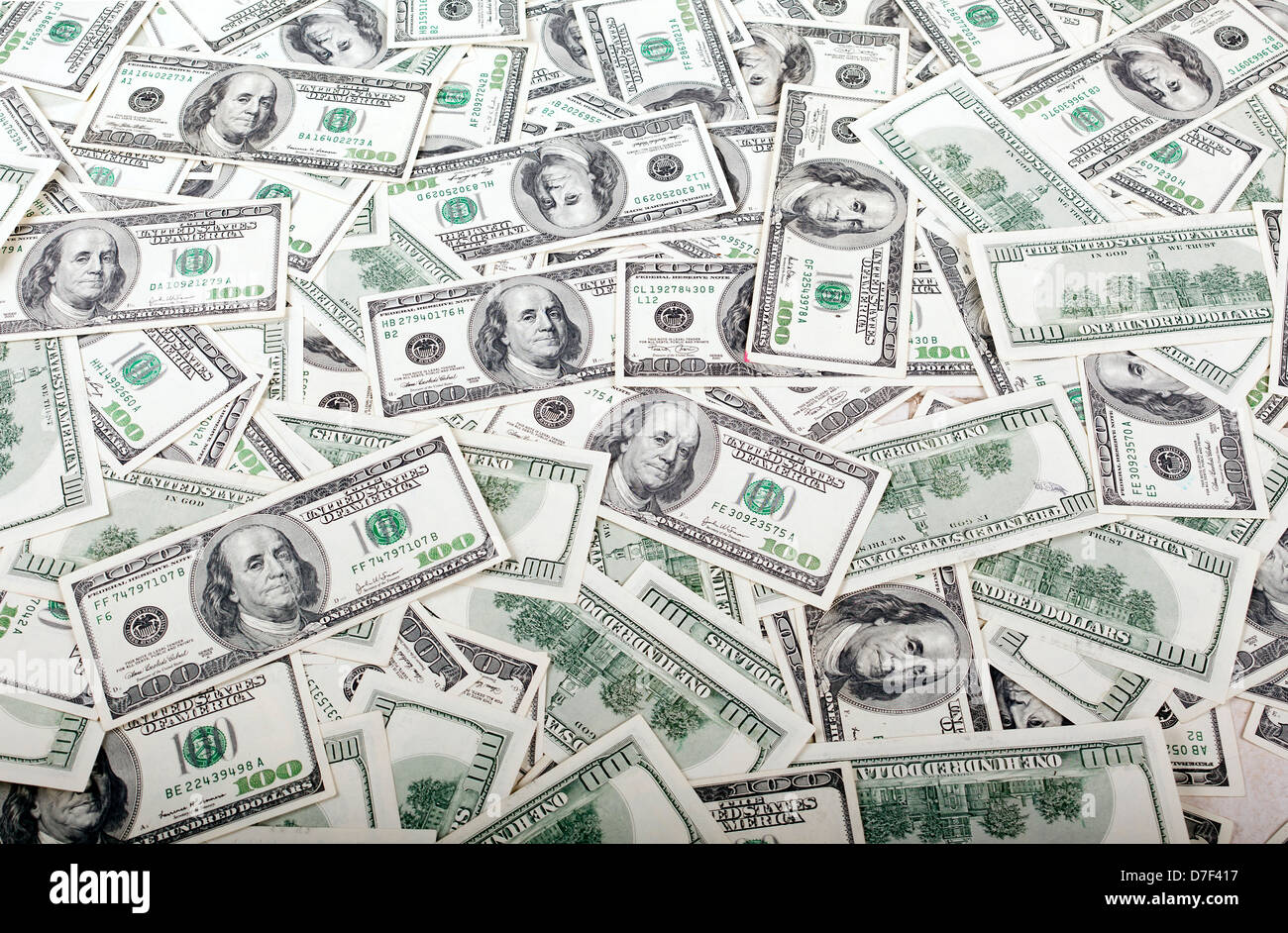 A messy carpet of 100 US$ money notes Stock Photo - Alamy