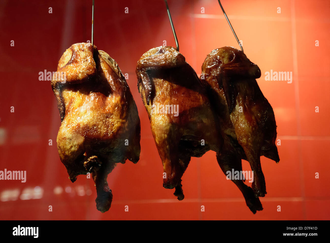 Roast ducks seen through a restaurant window in Kuala Lumpur, Malaysia ...