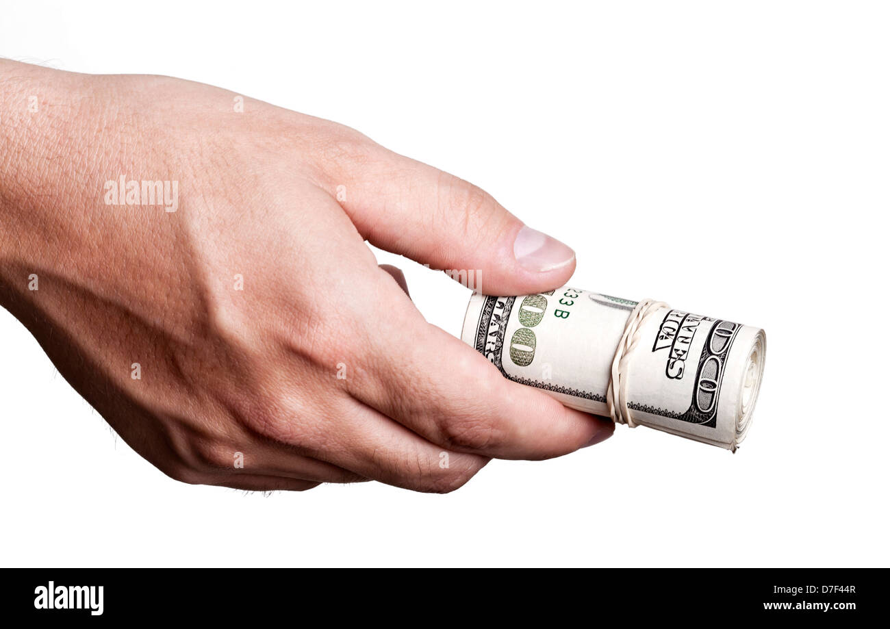 Close up right hand an adult man holding rolled up cluster 100 US ...