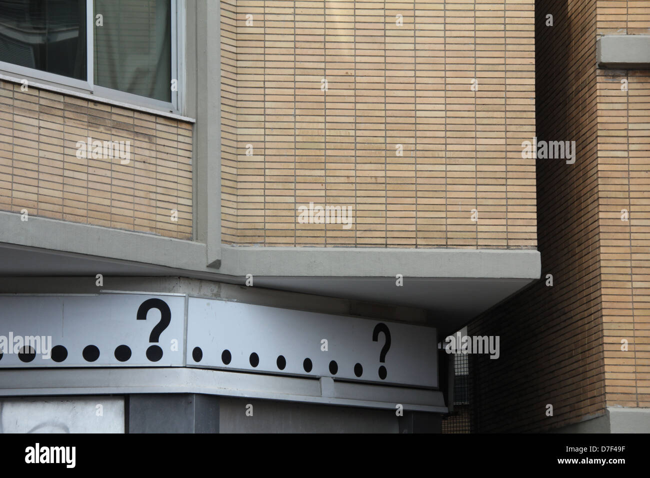 question mark on shop front in rome italy Stock Photo - Alamy