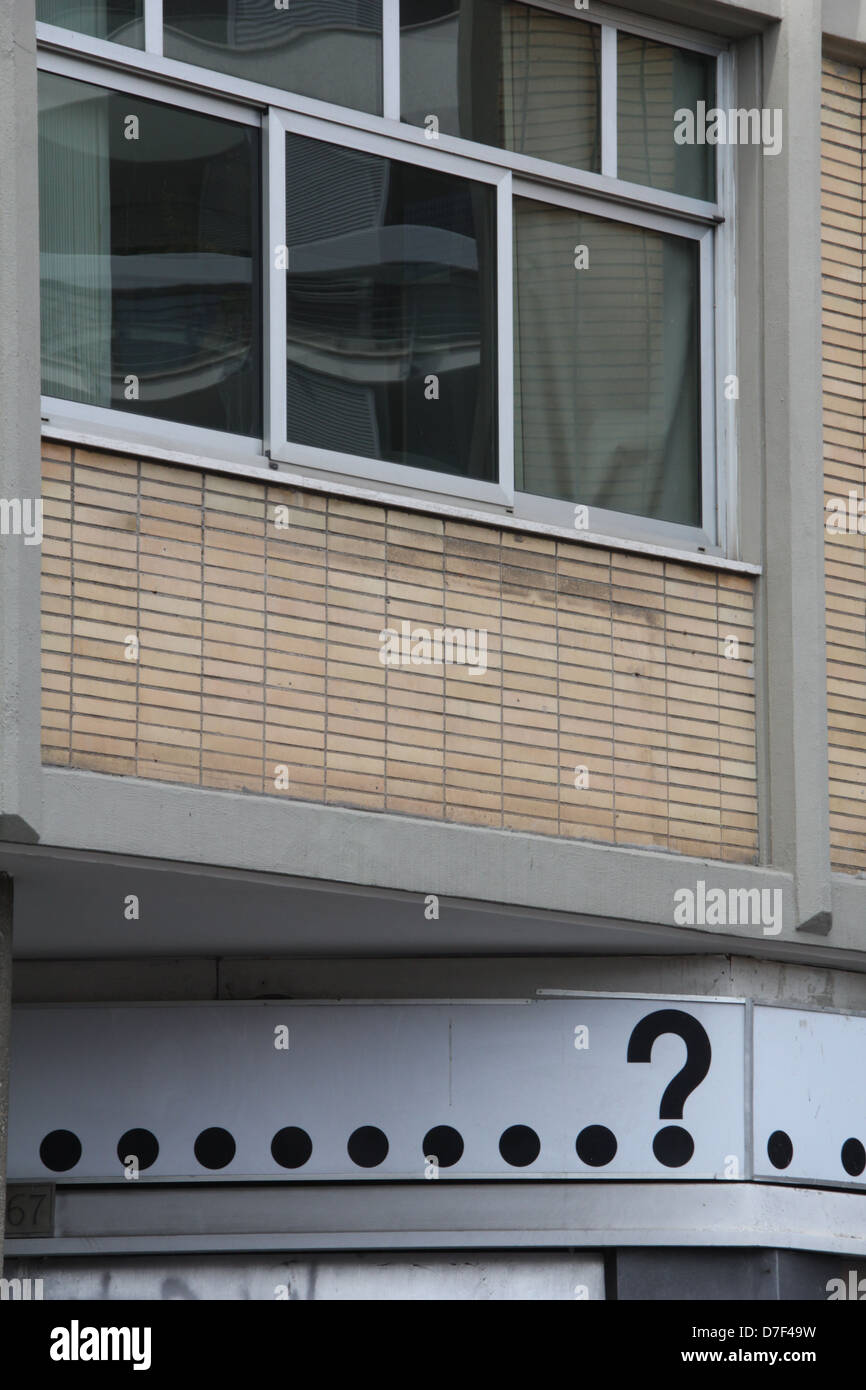question mark on shop front in rome italy Stock Photo - Alamy