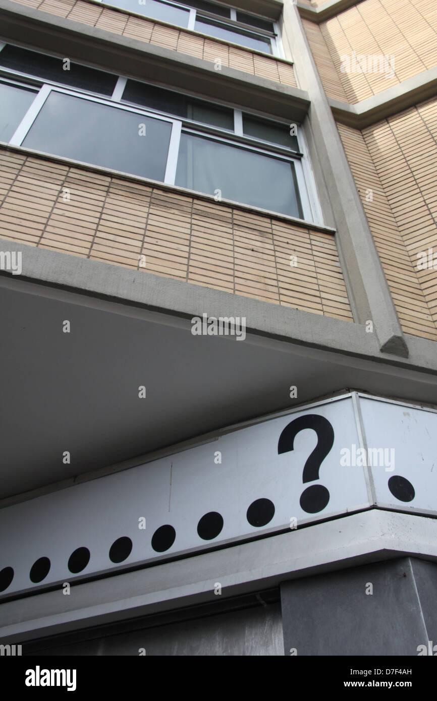question mark on shop front in rome italy Stock Photo - Alamy