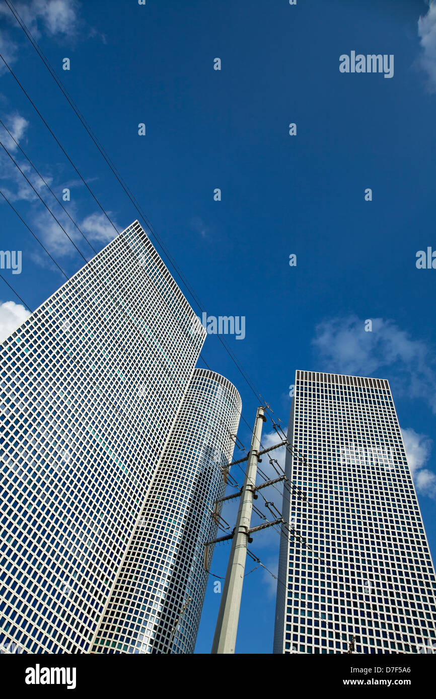 Three skyscrapers high voltage electricity pylon. Theis skyscraper ...