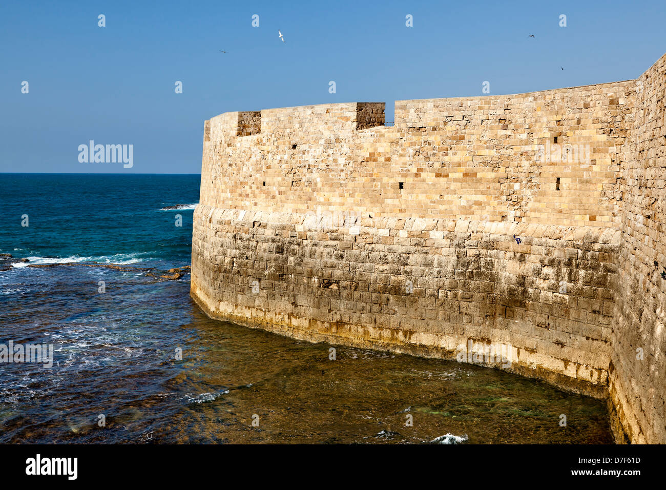 Part of the old town of Acco (Israel) city wall rising above the ...