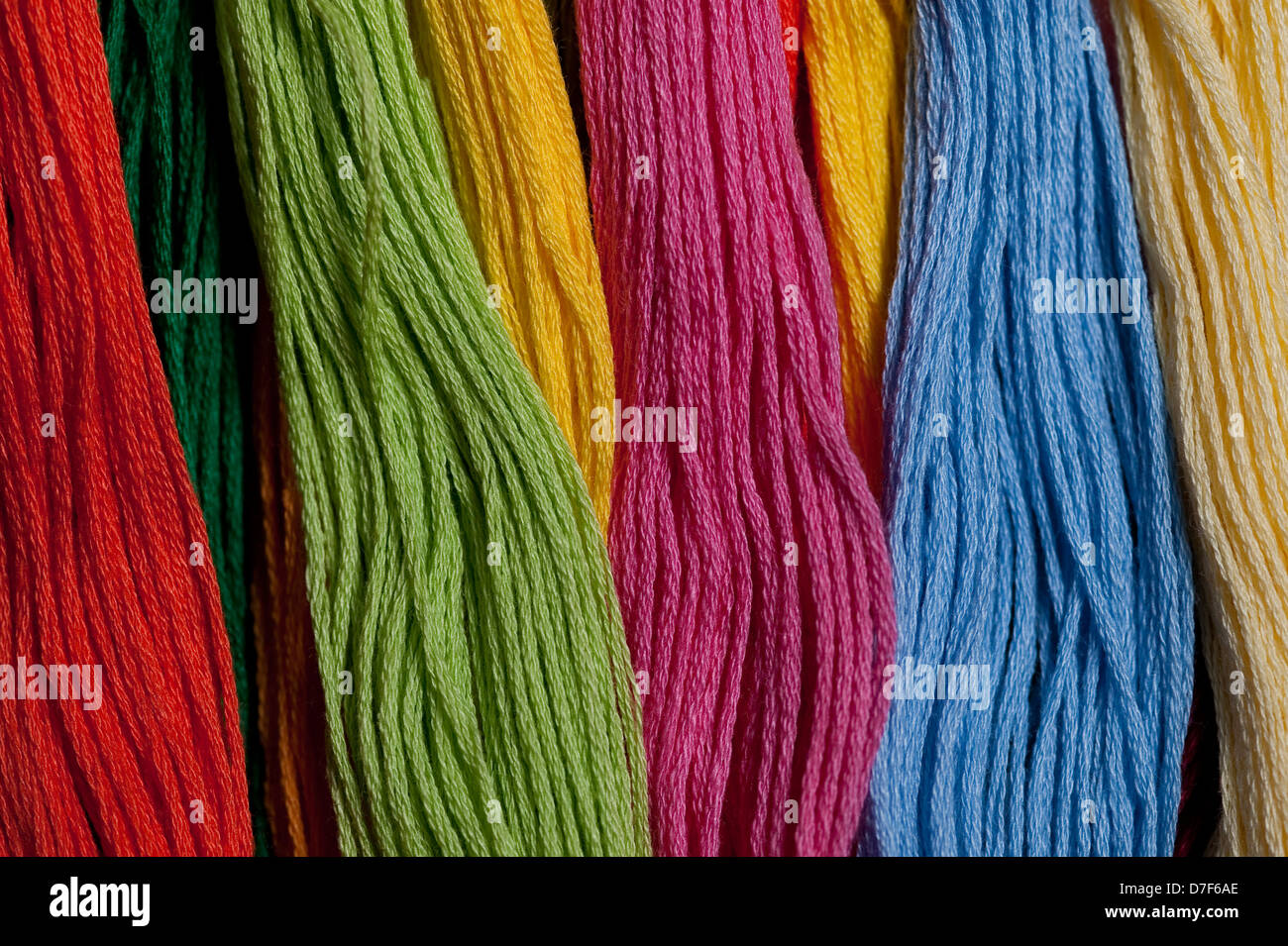 Multicolored embroidery thread in rows, patterns of colors Stock Photo ...