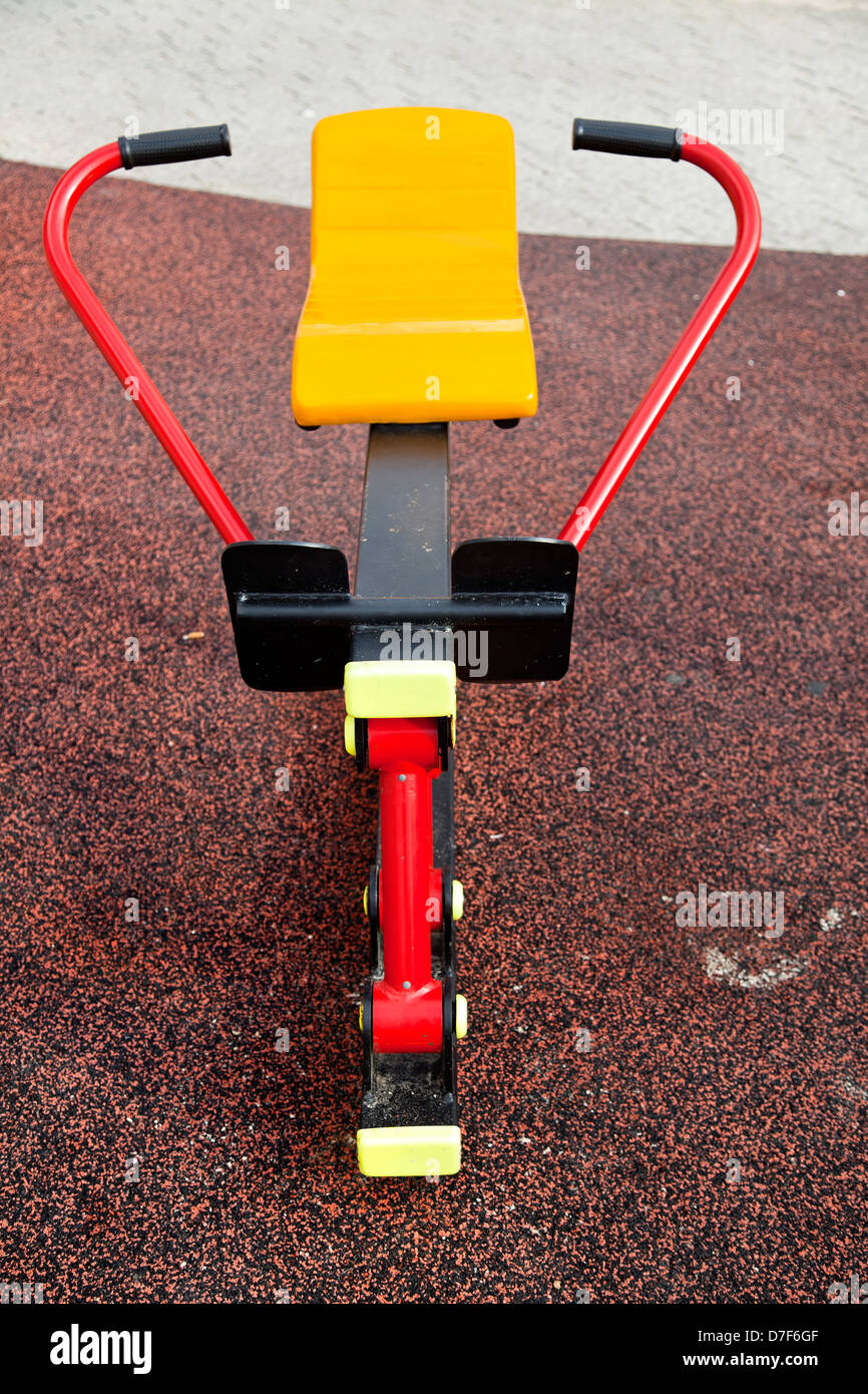Outdoors public excercise machine in a public park Stock Photo - Alamy