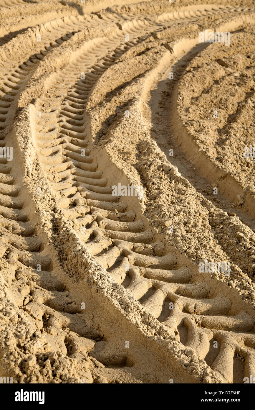 Tractor tire tracks on beach sand. Shallow depth of field Stock Photo ...