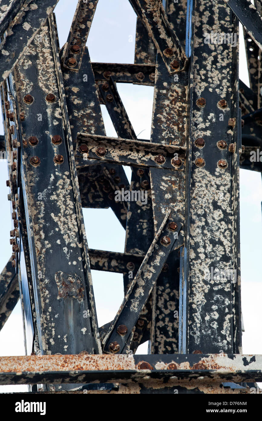 Salt damaged rusty metal beams run down bolts. This is part derrick ...