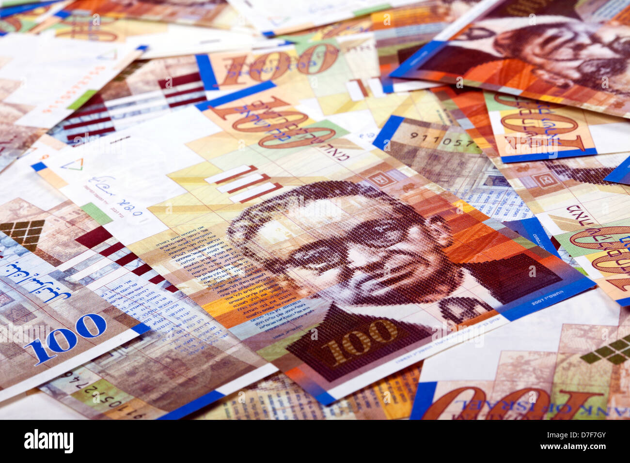 A high angle close up view of a very large amount of 100 NIS (New ...